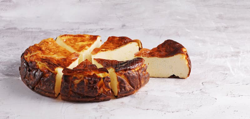 Homemade Basque Burnt Cheesecake Slice on Light Background, , Copy ...