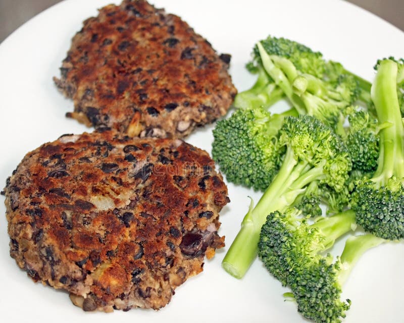Homemade Black Bean Burgers with a Side of Fresh Broccoli Stock Photo ...
