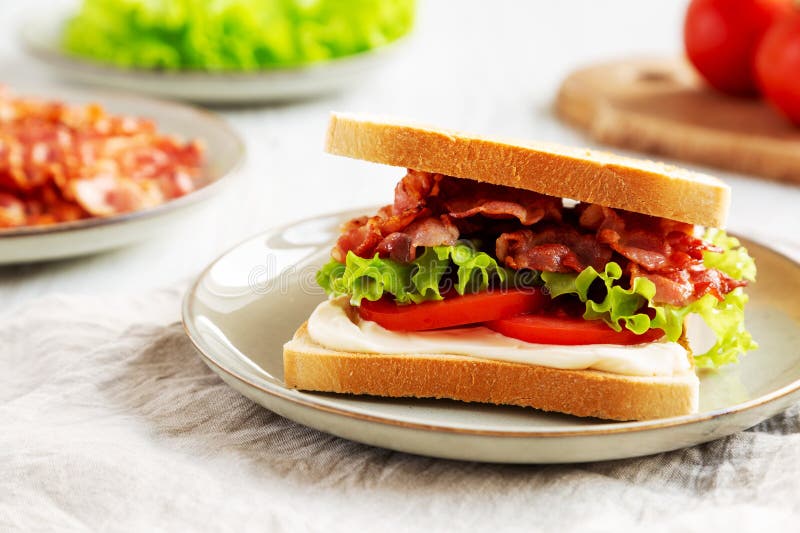Homemade BLT Sandwich (Bacon, Lettuce and Tomato) on a Plate, Side View ...
