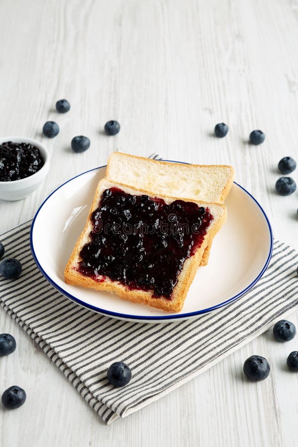 Homemade Blueberry Jam and Toast on a Plate, Side View Stock Photo ...