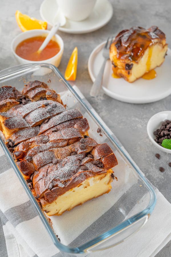 Homemade Bread Pudding with Chocolate Chips on a Gray Concrete ...