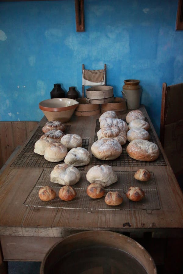 Different Sorts of Bread on a Table in an Old Kitchen Stock Photo ...
