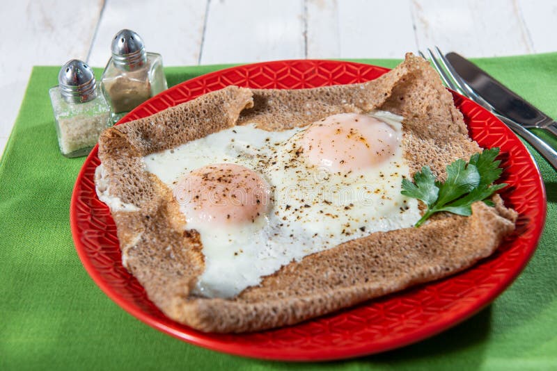 Homemade Breton Crepe with Egg in Red Plate Stock Image - Image of ...