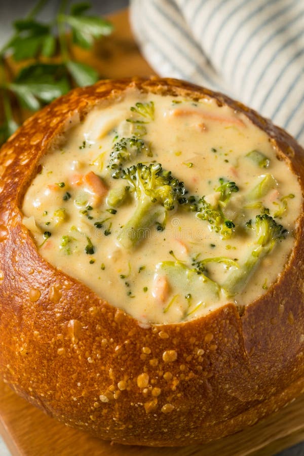 Homemade Broccoli Cheddar Soup Bread Bowl Stock Image - Image of herb ...