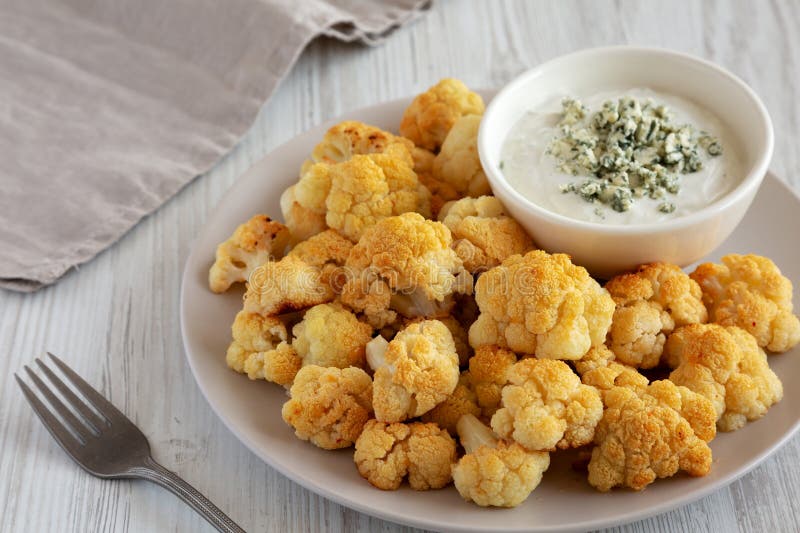 Homemade Buffalo Cauliflower with Blue Cheese Sauce, Side View Stock ...
