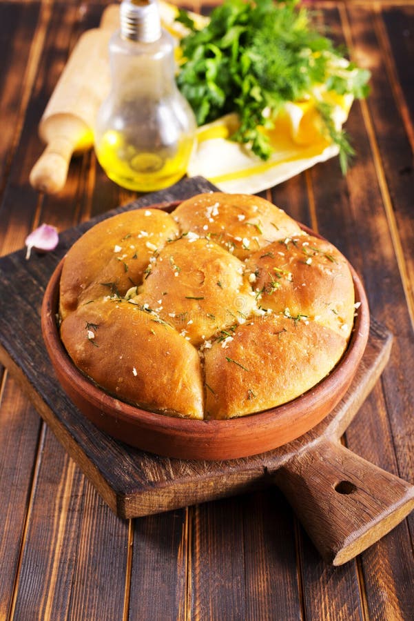 Homemade Buns with Garlic and Dill on Wooden Table Stock Photo - Image ...
