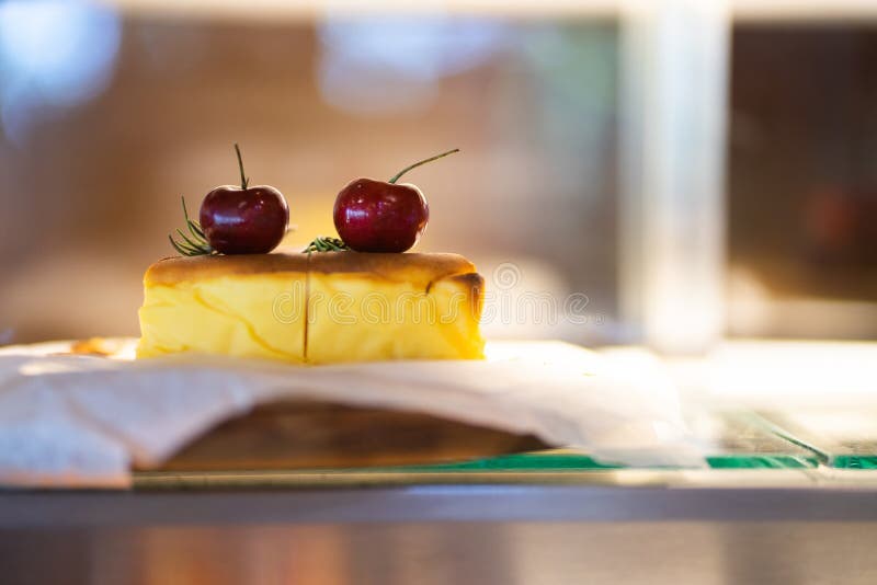 Homemade Cake Dessert with Red Cherry on Top Placed on Container ...