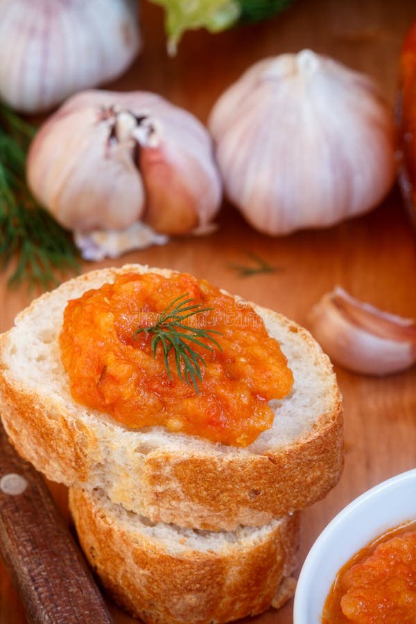 Homemade Caviar from Pumpkin, Zucchini, Tomatoes and Garlic on a Slice ...