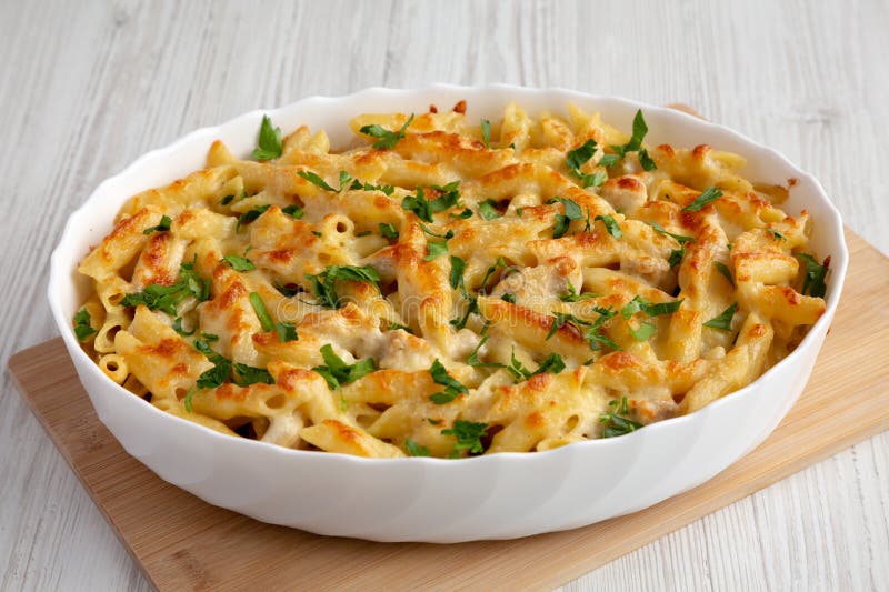 Homemade Cheesy Chicken Alfredo Pasta Bake in a Dish, Side View Stock ...