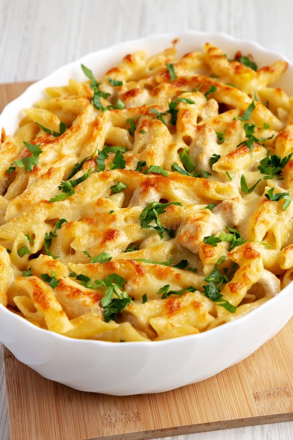 Homemade Cheesy Chicken Alfredo Pasta Bake in a Dish, Side View Stock ...