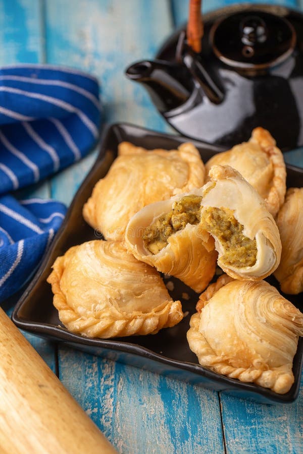 Homemade Chicken Curry Puffs on Wooden Table Stock Image - Image of ...