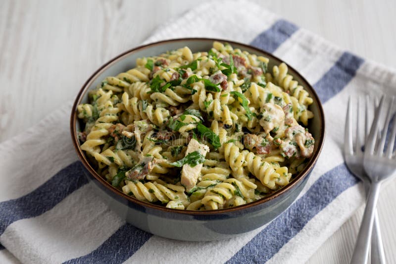 Homemade Chicken Spinach Alfredo Rotini Pasta in a Bowl, Side View ...