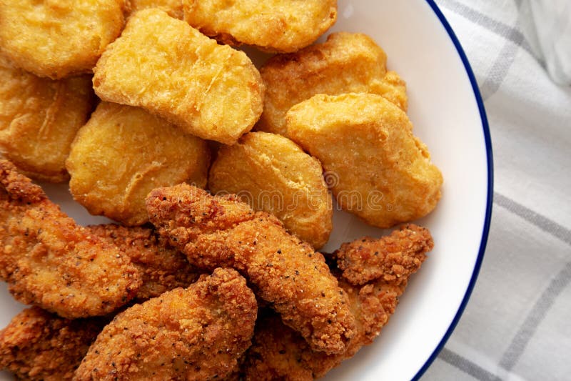 Homemade Chicken Strips and Nuggets Stock Photo - Image of fastfood ...