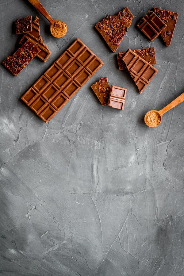 Homemade Chocolate. Bars and Broken Pieces on Grey Stone Table Frame ...