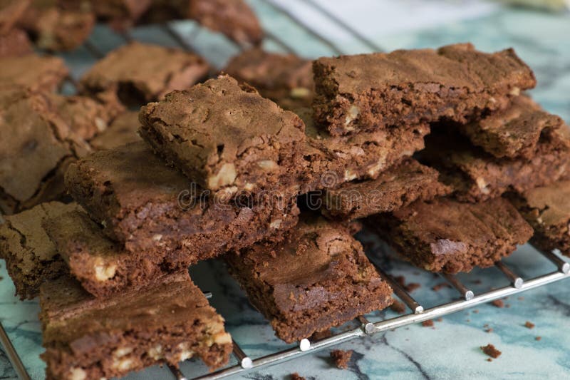 Homemade Chocolate Brownies with Nuts Cooling on Wire Rack Stock Photo ...