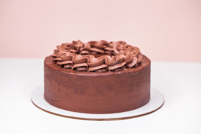 Chocolate Cake Topped with Whipped Ganache Stock Photo - Image of ...