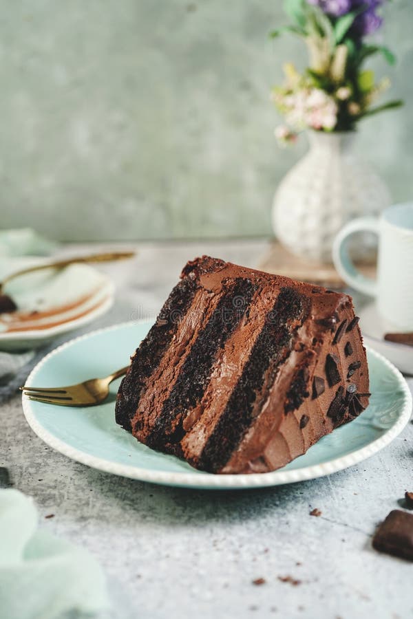 Homemade Chocolate Layer Cake with Mousse Filling Served on a Plate ...