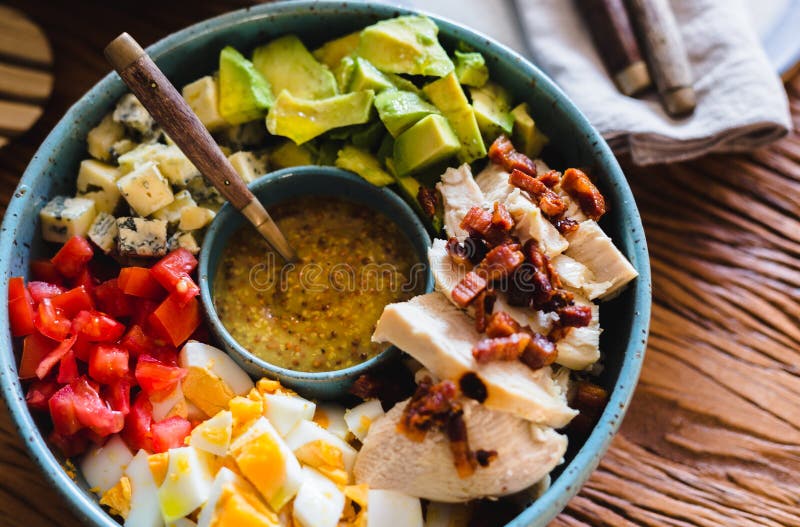 Homemade Cobb Salad on a Rustic Wood Surface Stock Photo - Image of ...