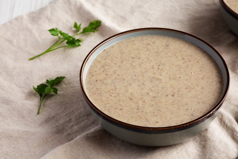 Homemade Cream of Mushroom Soup in a Bowl, Side View Stock Photo ...