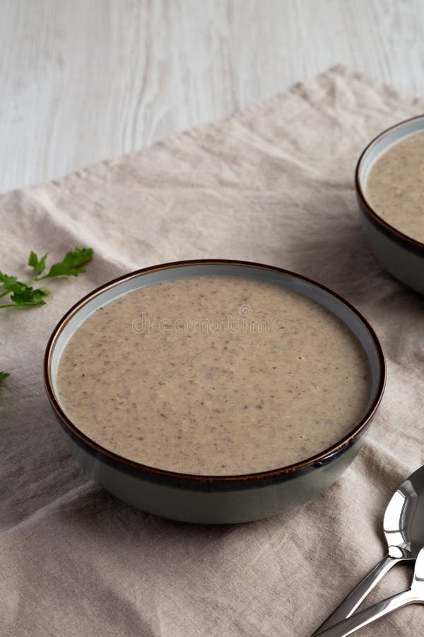 Homemade Cream of Mushroom Soup in a Bowl, Side View. Copy Space Stock ...