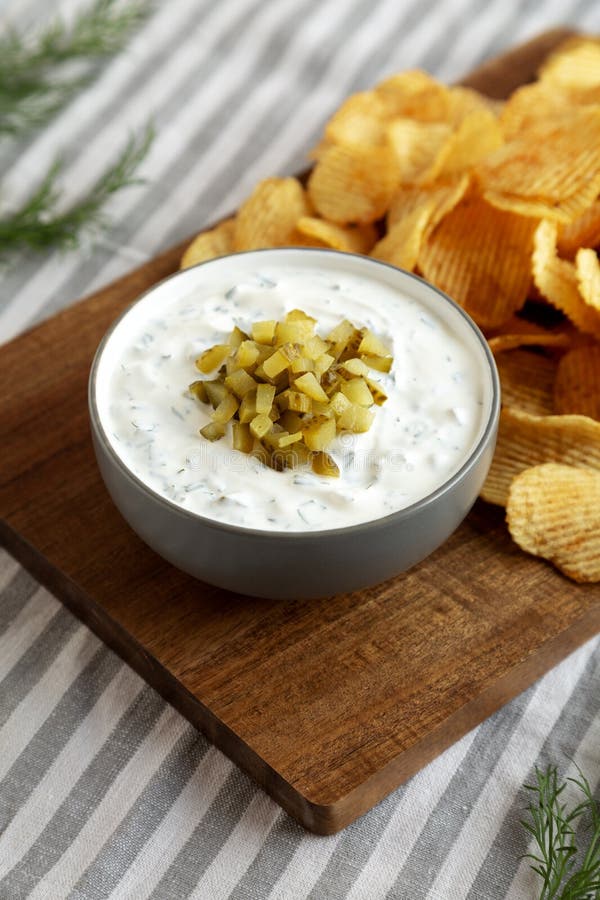 Homemade Creamy Pickle Dip with Potato Chips, Side View Stock Photo ...