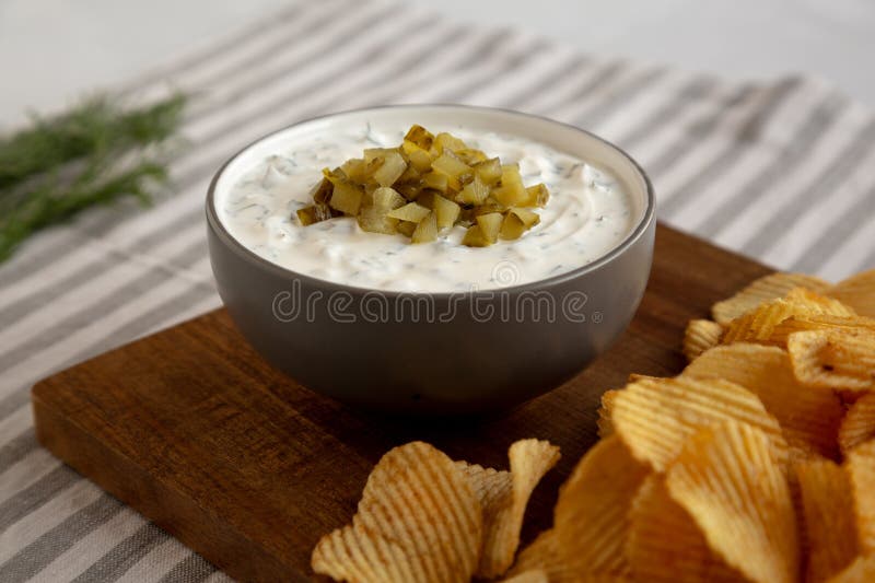 Homemade Creamy Pickle Dip with Potato Chips, Side View Stock Photo ...