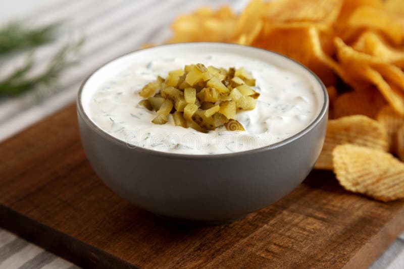 Homemade Creamy Pickle Dip with Potato Chips, Side View Stock Photo ...