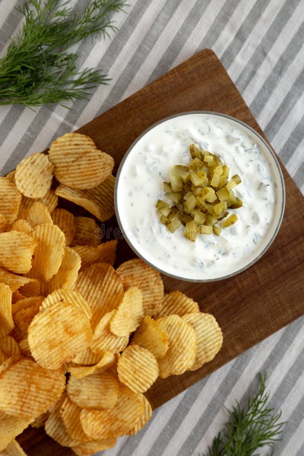 Homemade Creamy Pickle Dip with Potato Chips, Top View Stock Photo ...