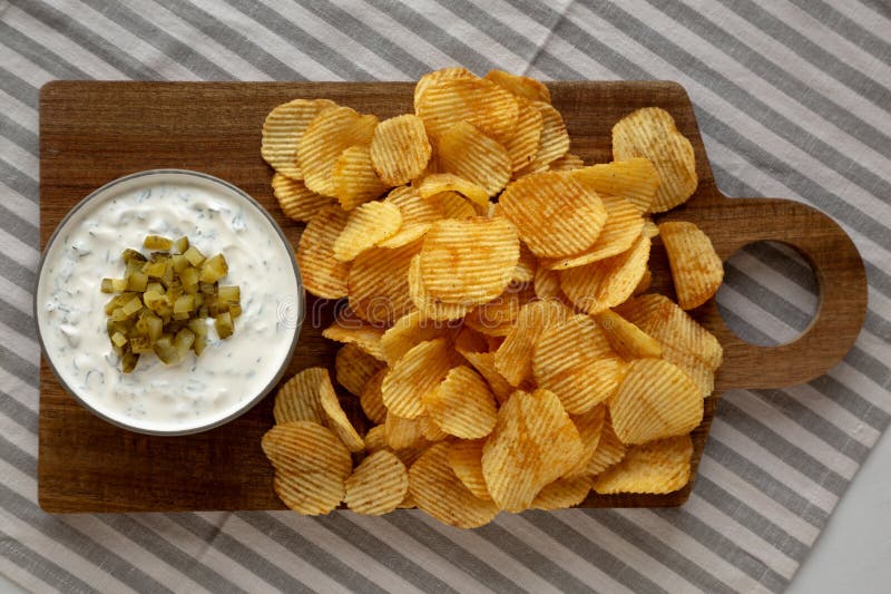 Homemade Creamy Pickle Dip with Potato Chips, Top View Stock Photo ...