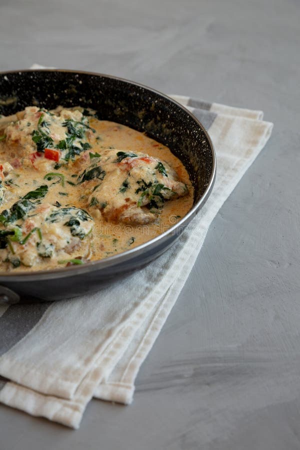 Homemade Creamy Tuscan Chicken with Spinach in a Pan, Low Angle View ...