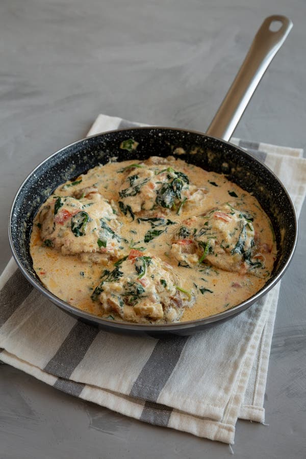 Homemade Creamy Tuscan Chicken with Spinach in a Pan, Side View Stock ...