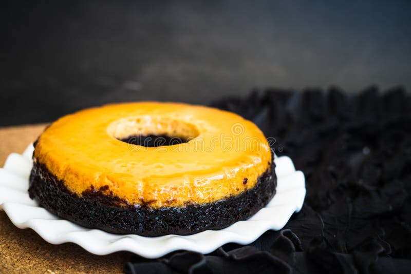 Homemade Creme Caramel Custard Pudding with Chocolate Cake. Side View ...