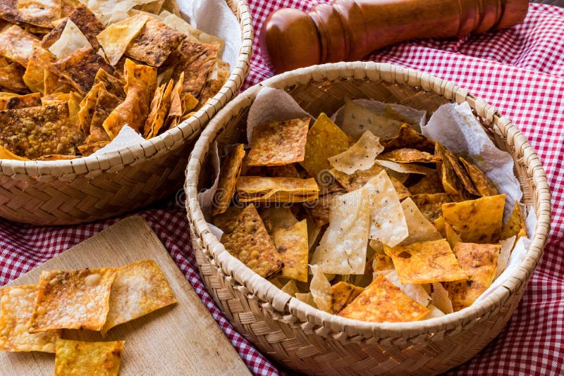 Homemade Crispy Chips / Snacks in a Wicker Bowl. Stock Photo - Image of ...