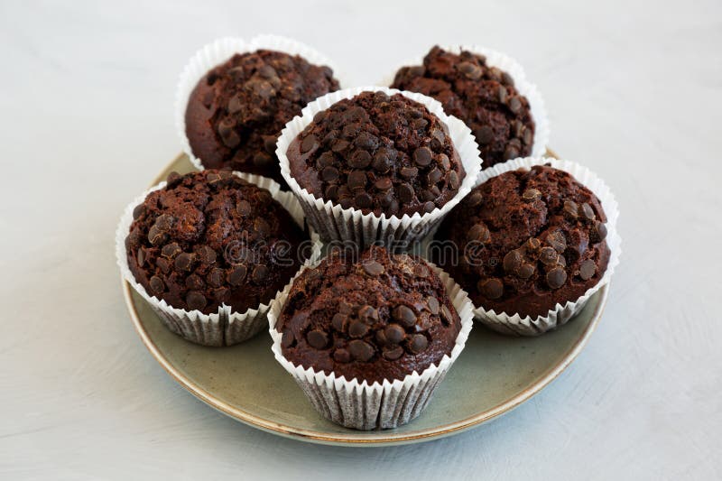 Homemade Dark Chocolate Muffins on a Plate, Side View Stock Photo ...