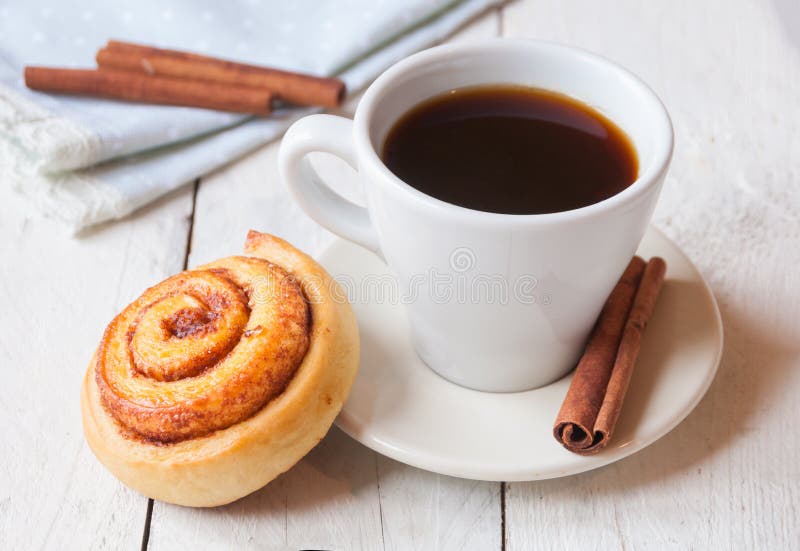 Cinnamon roll with coffee stock photo. Image of roll - 93087048