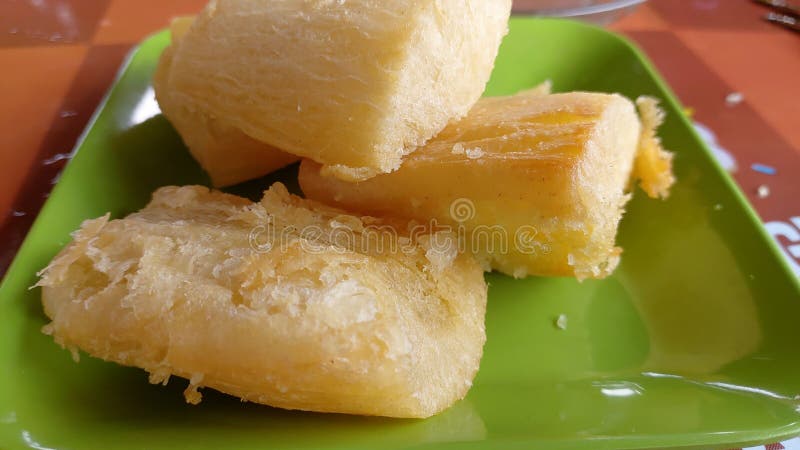 Fried Cassava with Topping Grated Cheese on Top Stock Photo - Image of ...