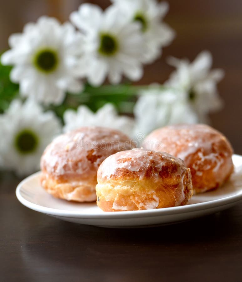 Homemade donuts on a plate stock photo. Image of cakes - 109039620