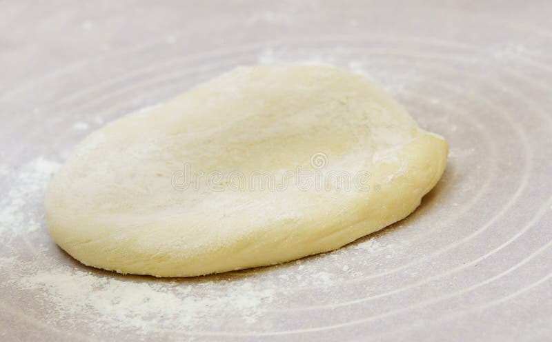 Homemade Dough is Cut in Half on a Floured Surface Stock Photo - Image ...