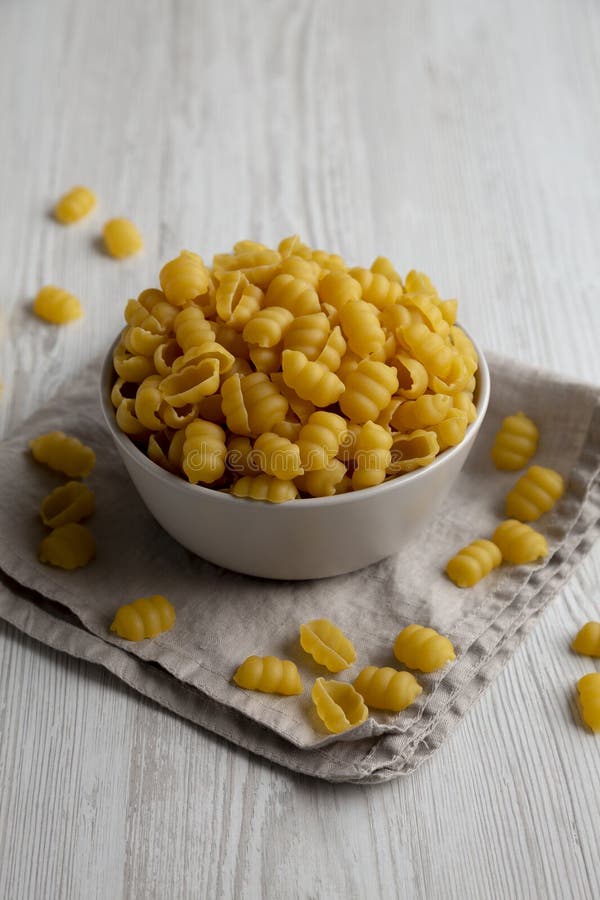 Homemade Dry Raw Gnocchi Pasta in a Bowl, Side View Stock Photo - Image ...