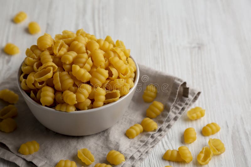 Homemade Dry Raw Gnocchi Pasta in a Bowl, Side View. Copy Space Stock ...
