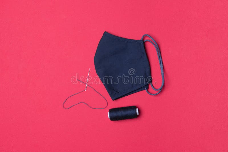 Homemade Face Mask with Needle and Thread Stock Photo - Image of face ...