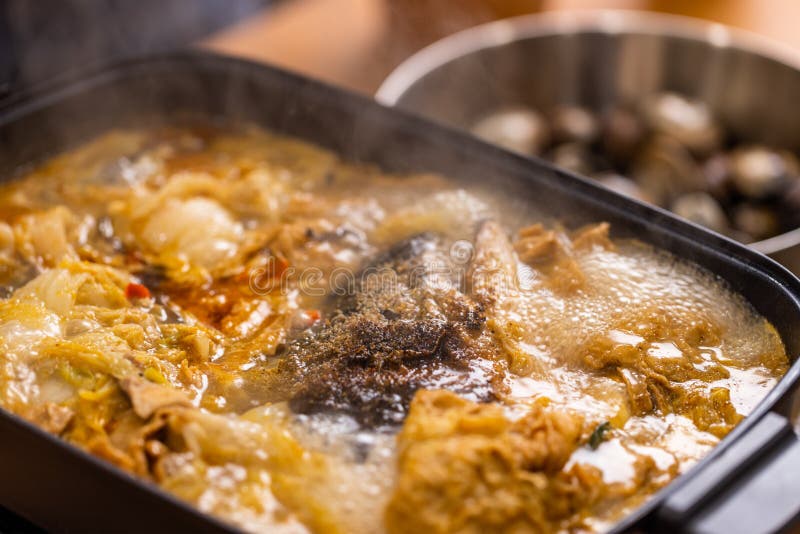 Homemade fish soup hot pot stock image. Image of head - 264593903