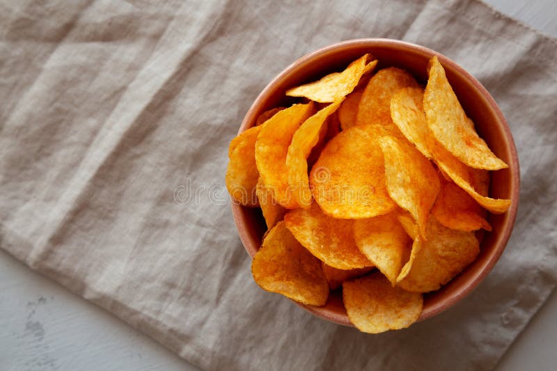 Homemade Flavored Cheese Potato Chips in a Bowl, Top View. Copy Space ...