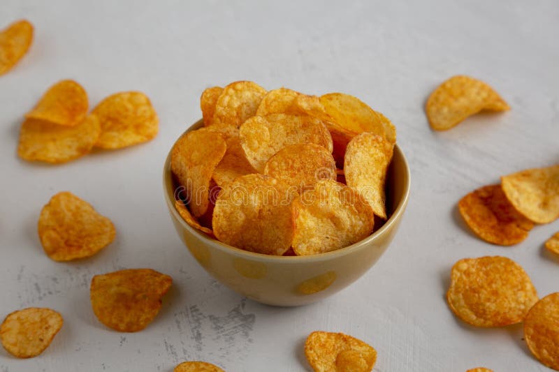 Homemade Flavored Paprika Potato Chips in a Bowl, Side View Stock Image ...