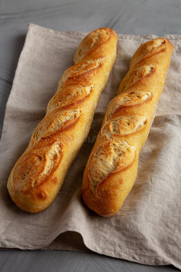 Homemade French Bread Baguette on a Gray Background, Side View Stock ...