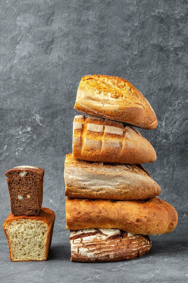 Homemade Fresh Baked Various Loafs of Wheat and Rye Bread. Vertical ...