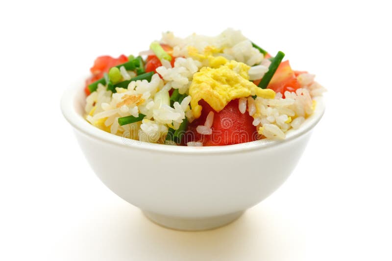 Homemade Fried Rice with Tomatoes and Egg on White with Clipping Path ...