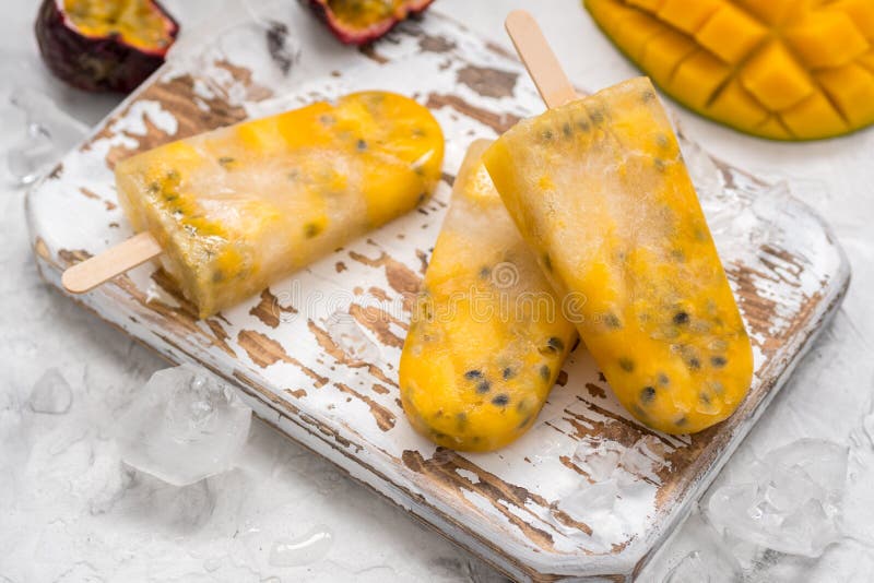 Homemade Frozen Popsicles with Fresh Mango and Passion Fruit Stock ...