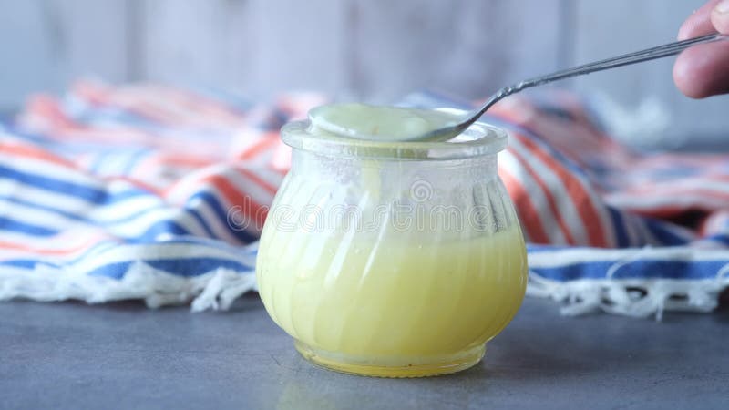 Homemade Ghee in Container on a Table , Stock Video - Video of ghee ...