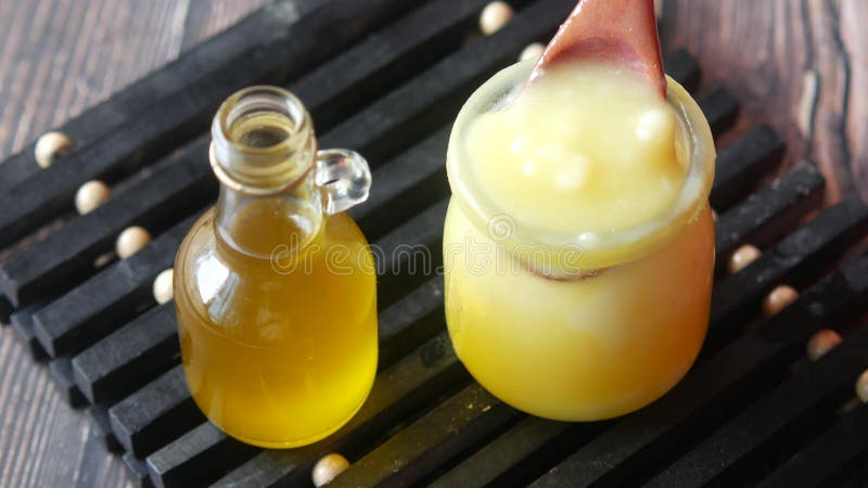 Homemade Ghee in Container on a Table , Stock Video - Video of golden ...